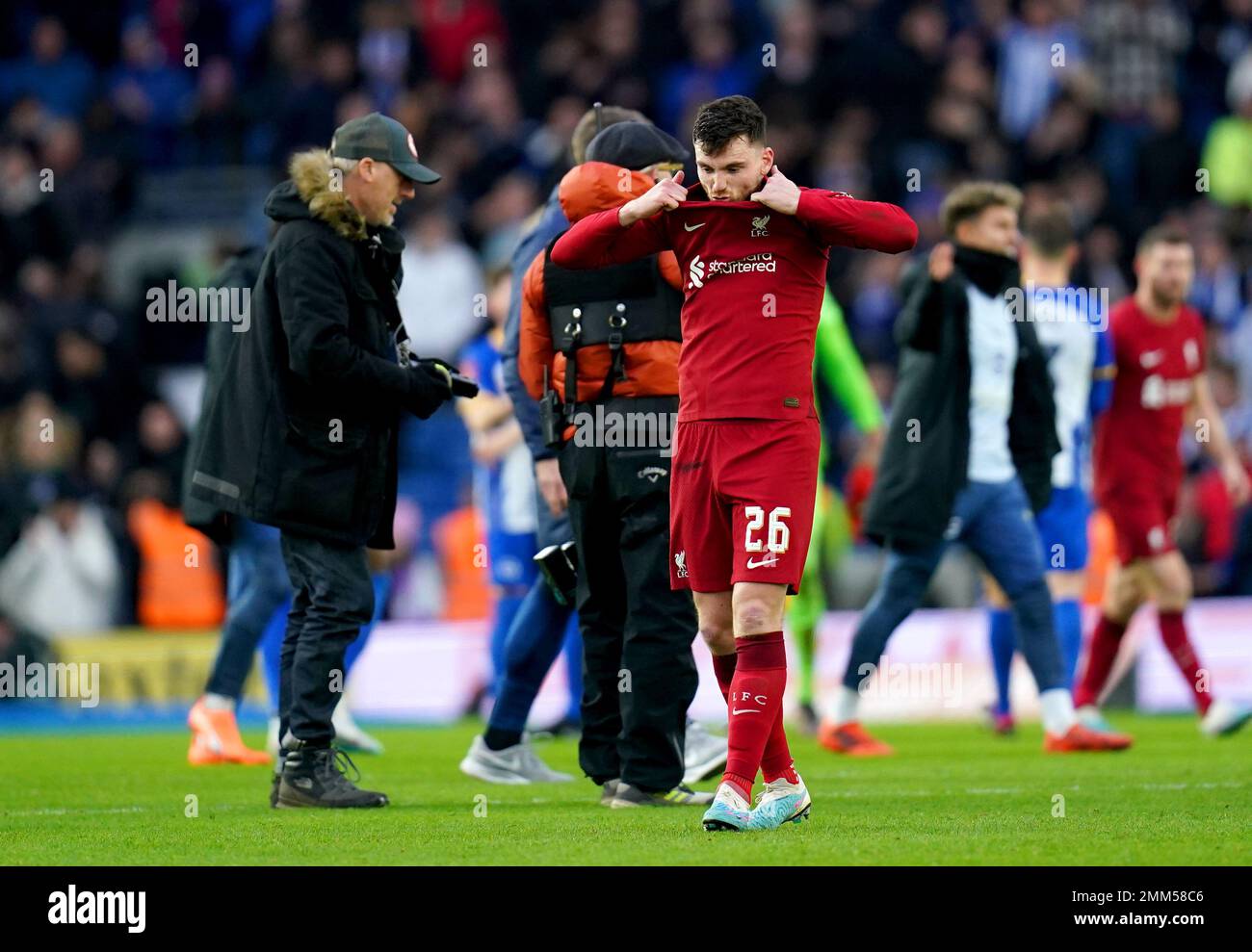 Liverpool's Andrew Robertson appears dejected at the end of the ...