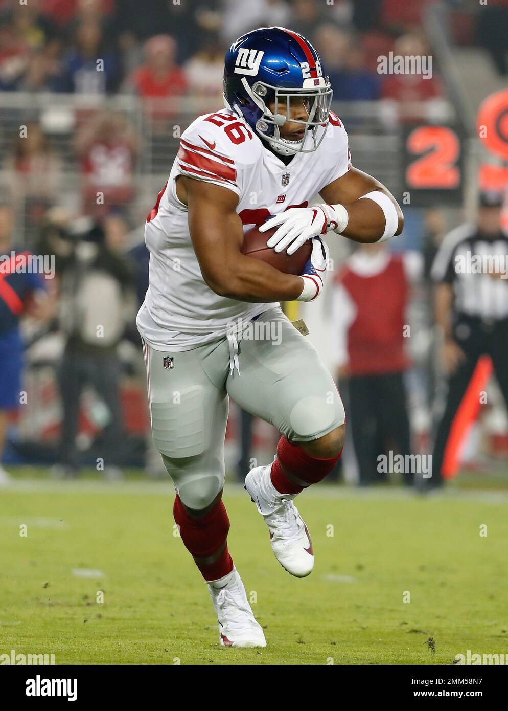 New York Giants running back Saquon Barkley (26) runs against the San ...