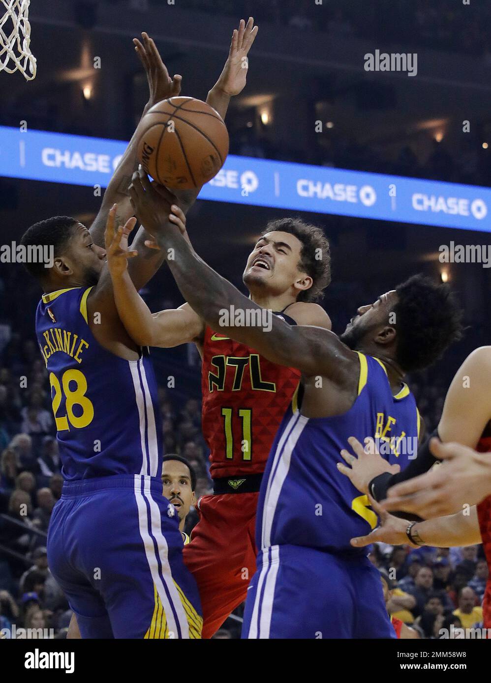 Atlanta Hawks guard Trae Young (11) shoots between Golden State ...