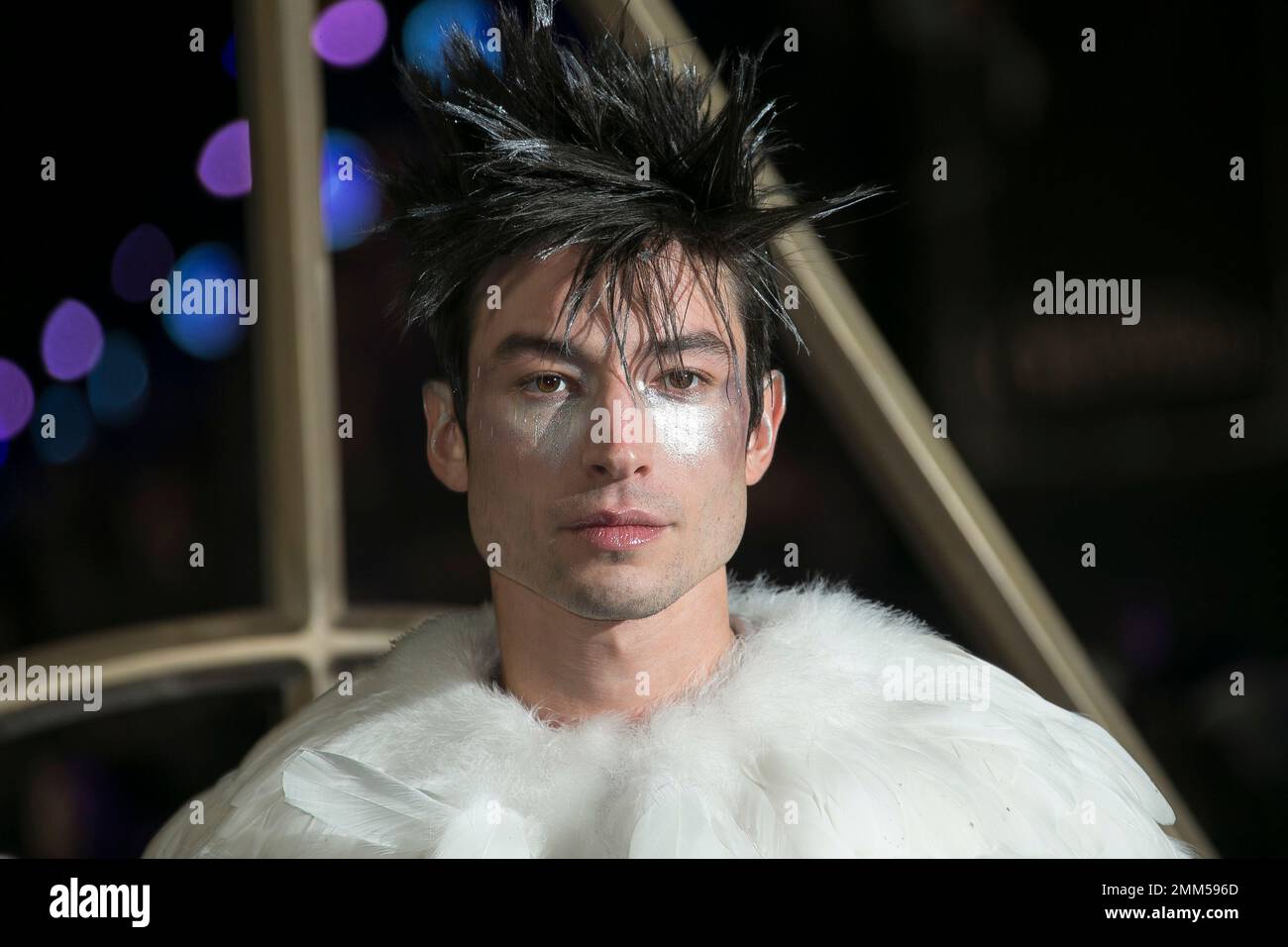 Actor Ezra Miller poses for photographers upon arrival at the premiere ...