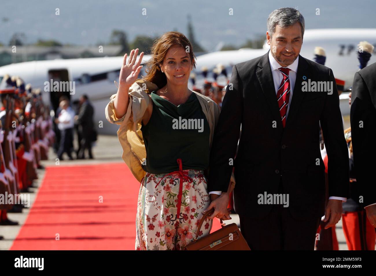 Paraguay's first lady Silvana Lopez waves to photographers while ...