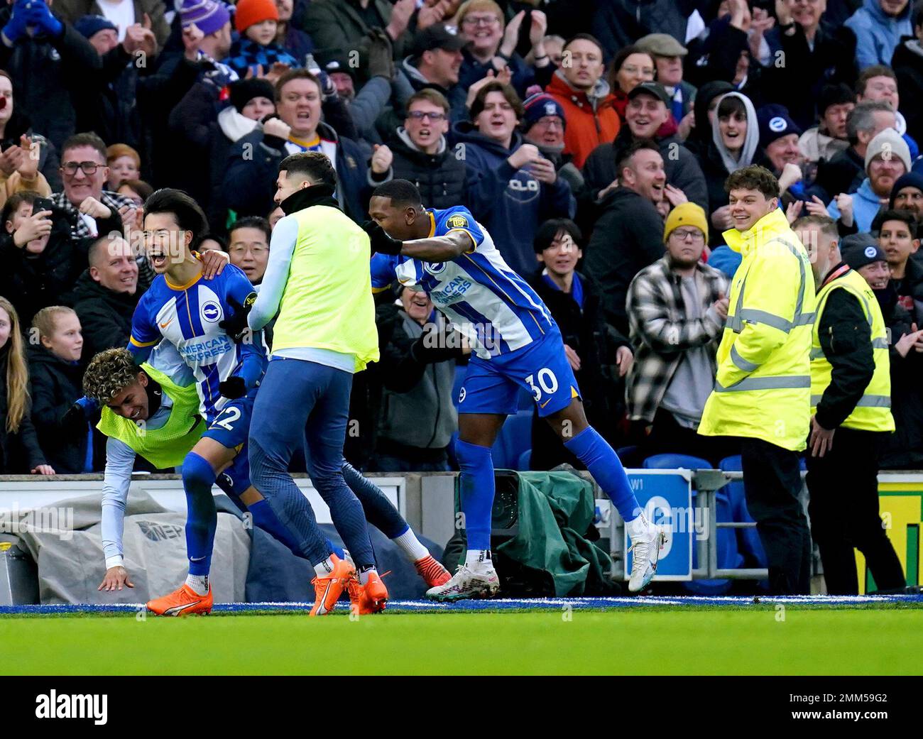 Brighton and Hove Albion's Kaoru Mitoma celebrates with his team-mates ...