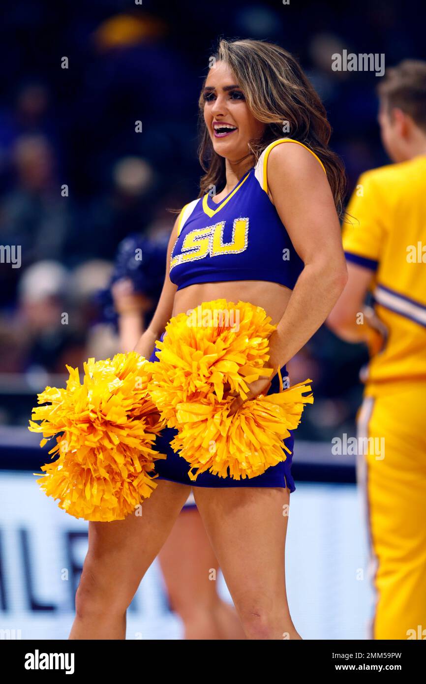 LSU cheerleaders perform in the first half an NCAA college basketball ...