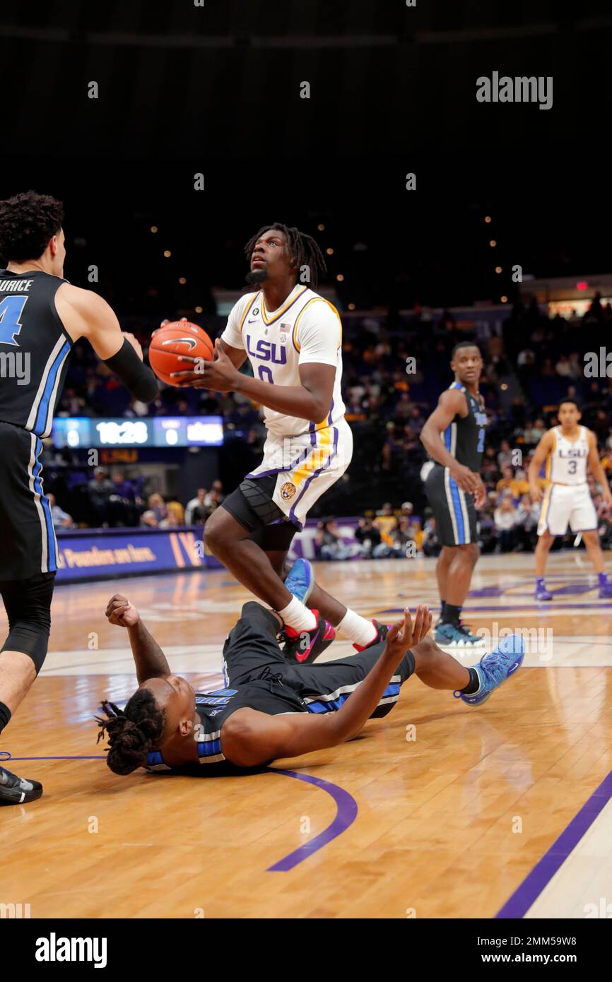 LSU forward Naz Reid (0) goes to shoot as Memphis forward Kyvon ...