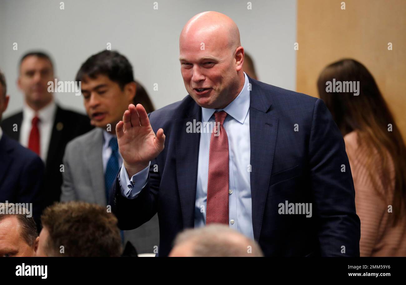 Acting Attorney General Matthew Whitaker, right, greets state and local ...