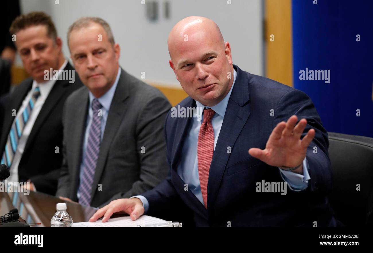 Acting Attorney General Matthew Whitaker, right, greets state and local ...
