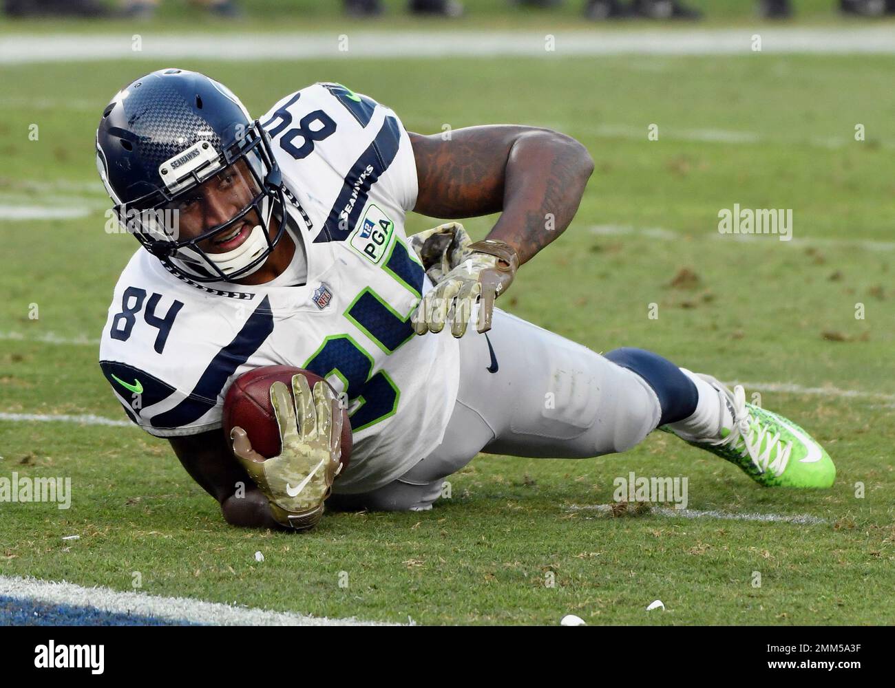 Seattle Seahawks tight end Ed Dickson (84) tries to land closer to the ...