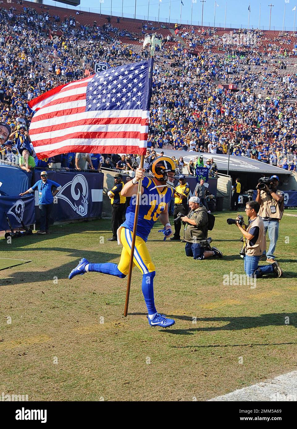Los Angeles Rams wide receiver Cooper Kupp (18) heads onto the field ...