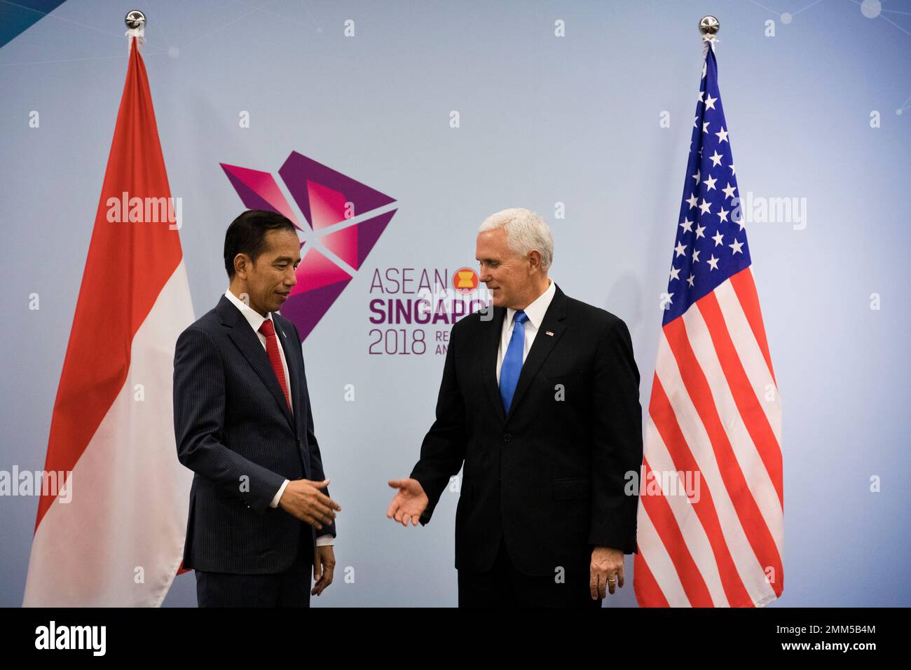 U.S. Vice President Mike Pence, right, and Indonesia's President Joko ...