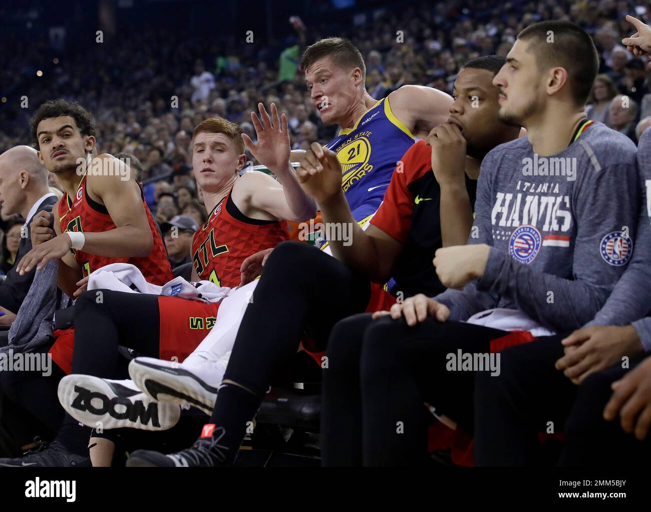 Golden State Warriors forward Jonas Jerebko (21) falls into the Atlanta ...