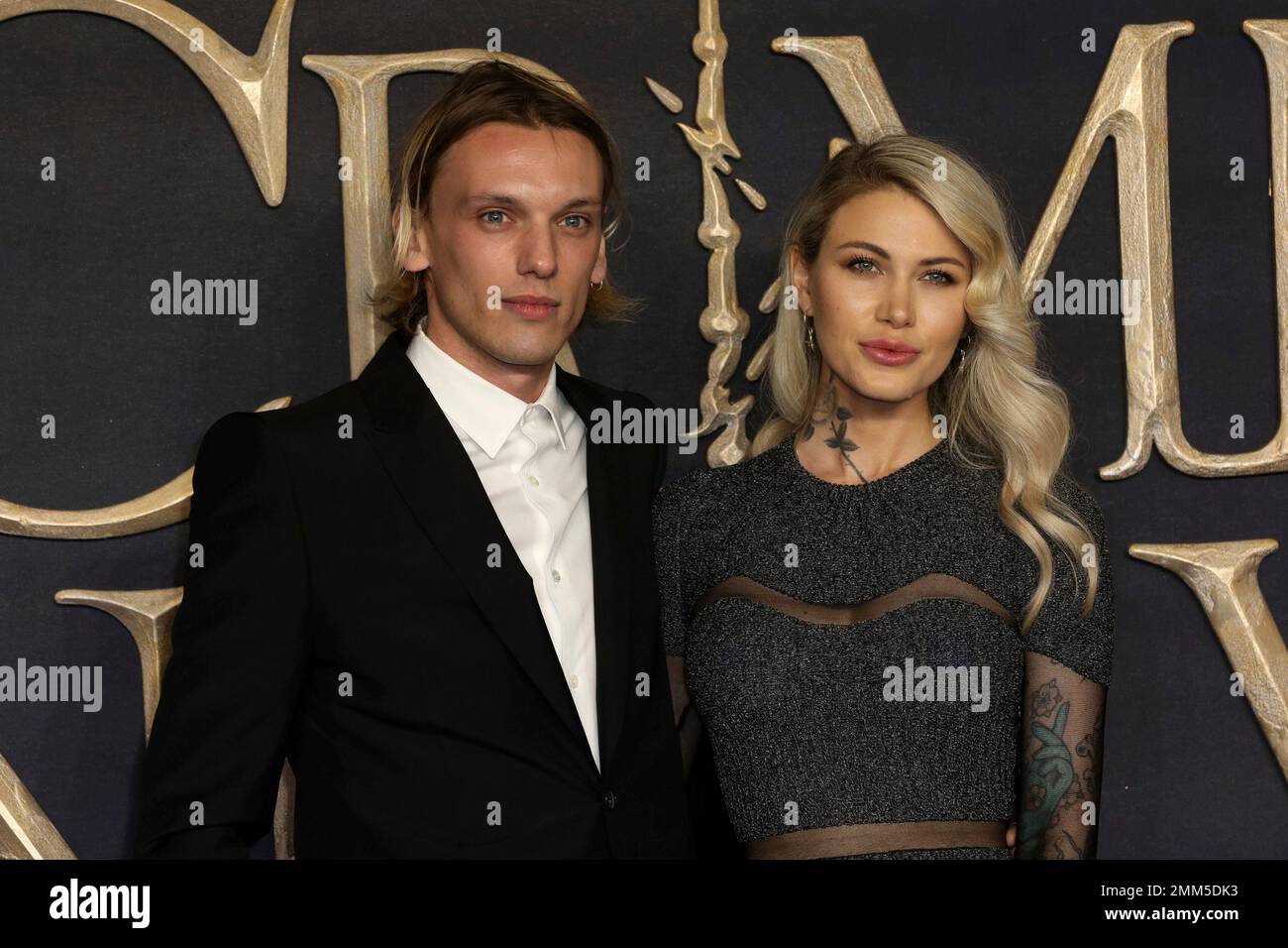 Actor Jamie Campbell Bower and partner Ruby Quilter pose for ...
