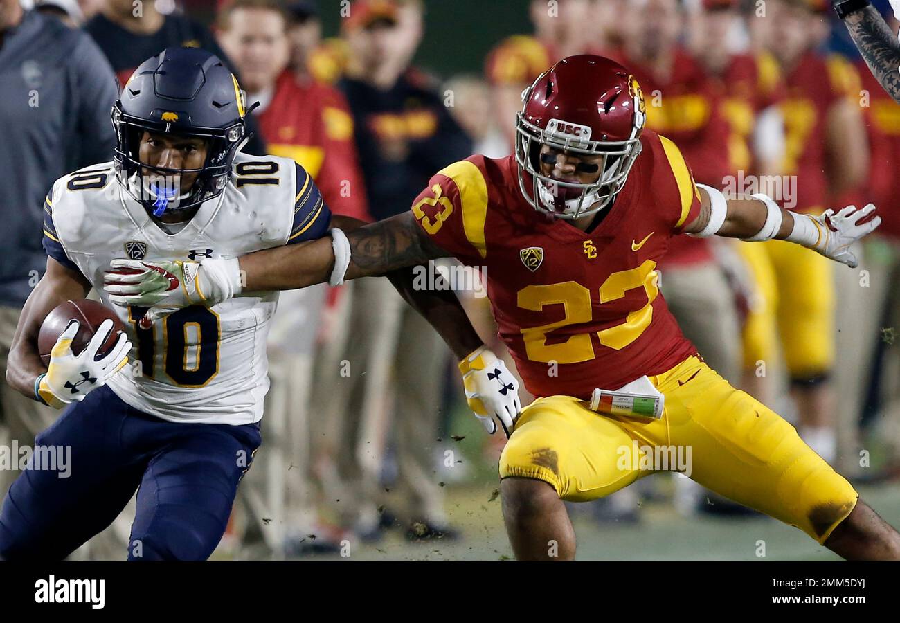 Southern California cornerback Jonathan Lockett, right, pushes ...