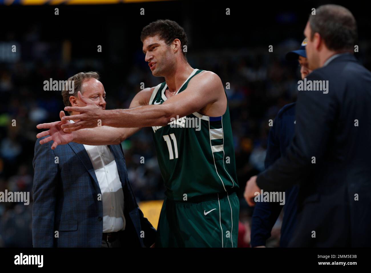 Milwaukee Bucks center Brook Lopez (11) chats with Milwaukee Bucks head ...