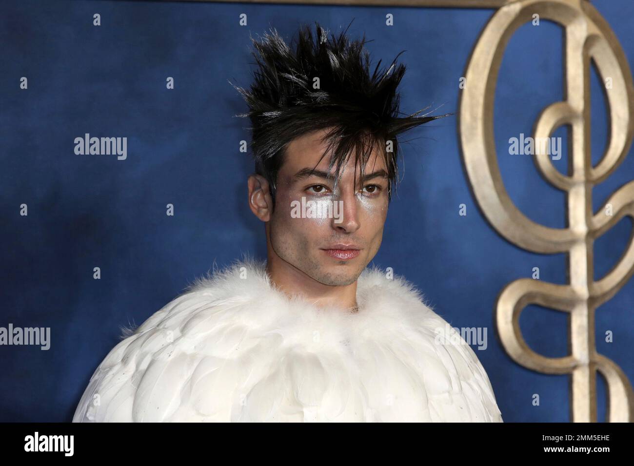 Actor Ezra Miller poses for photographers on arrival at the premiere of ...