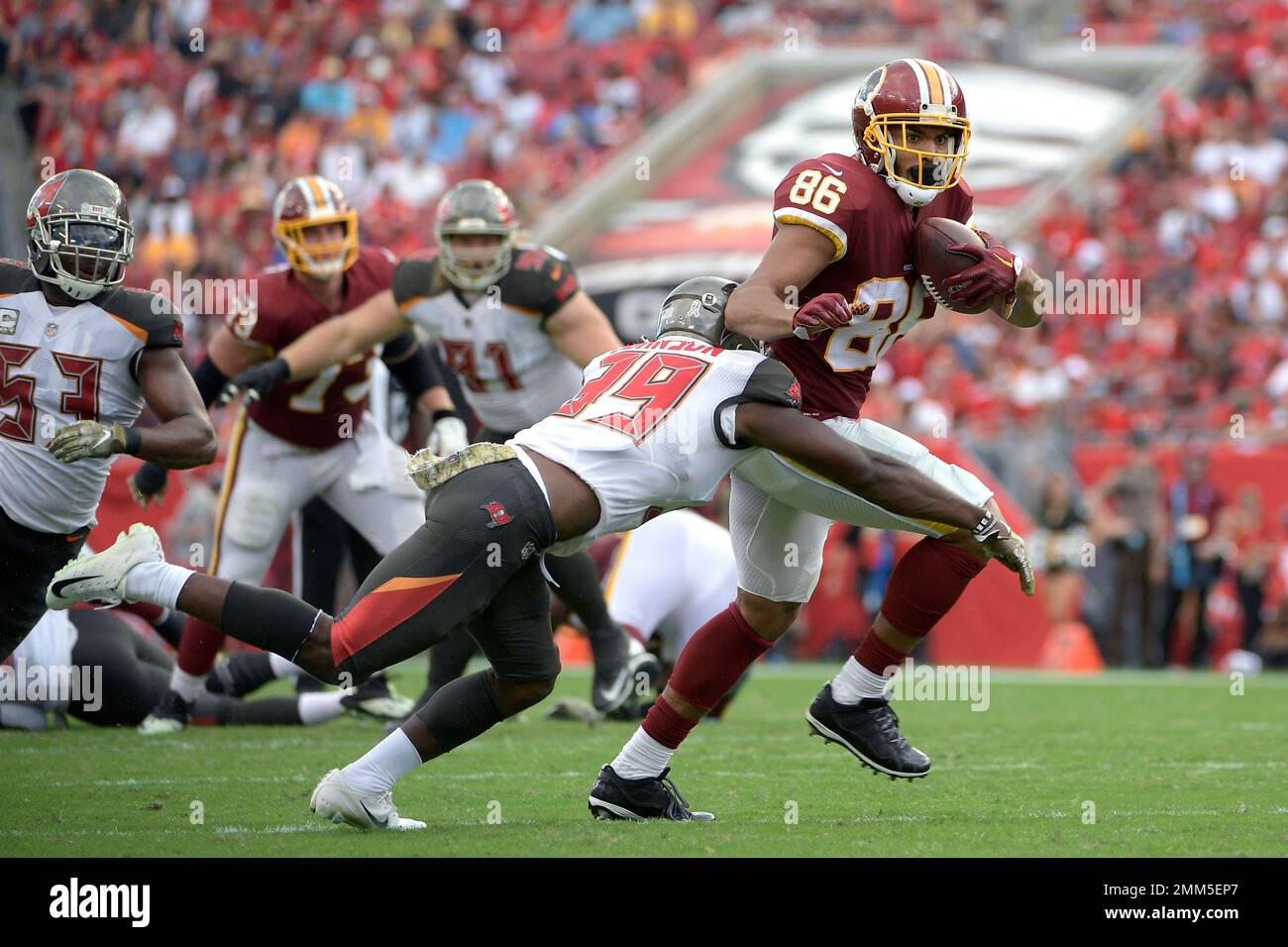 Washington Redskins tight end Jordan Reed (86) is tackled by Tampa Bay ...