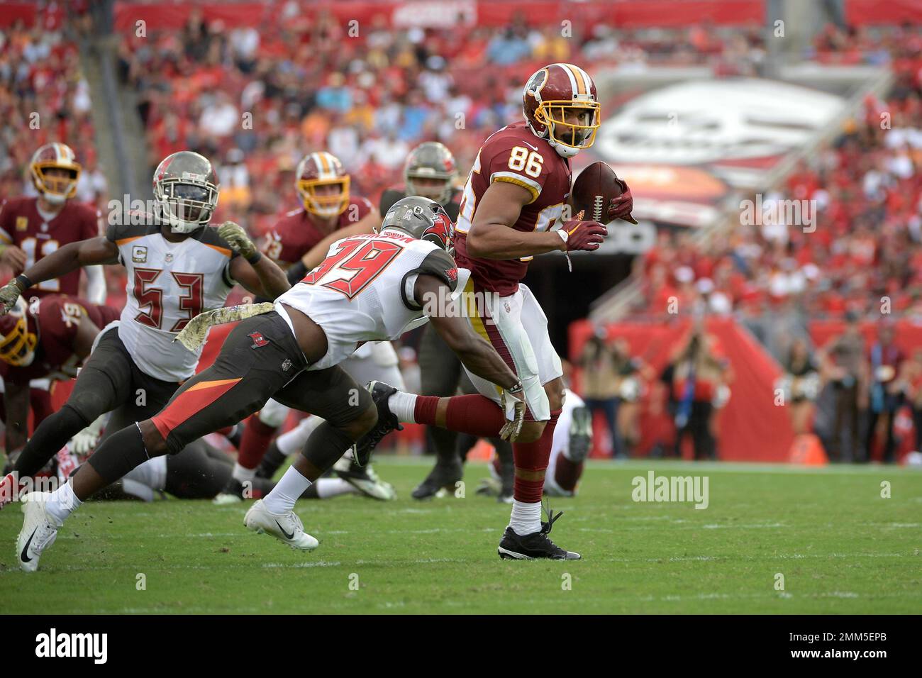 Washington Redskins tight end Jordan Reed (86) is tackled by Tampa Bay ...