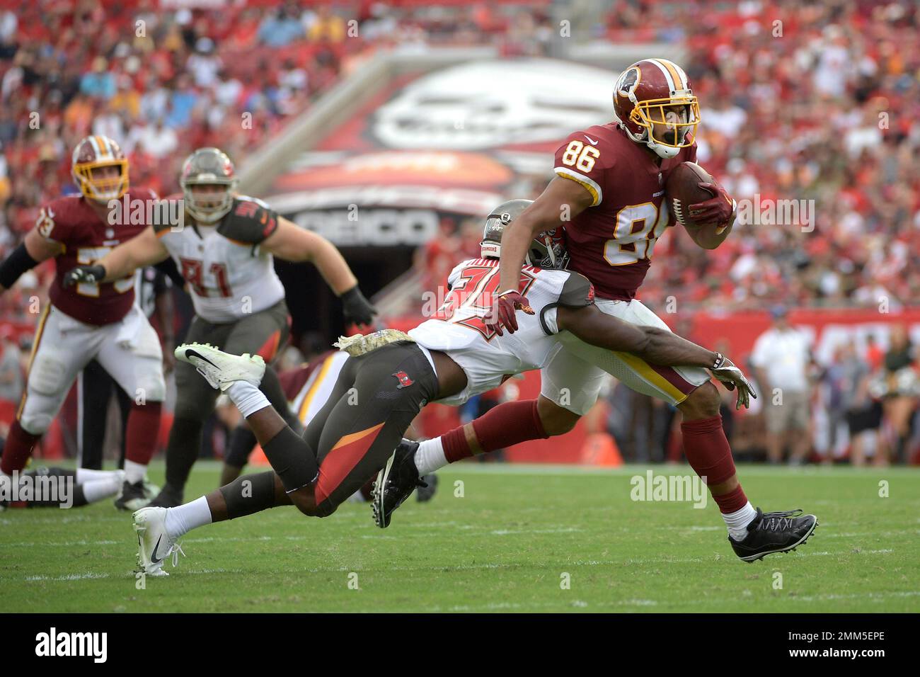 Washington Redskins tight end Jordan Reed (86) is tackled by Tampa Bay ...