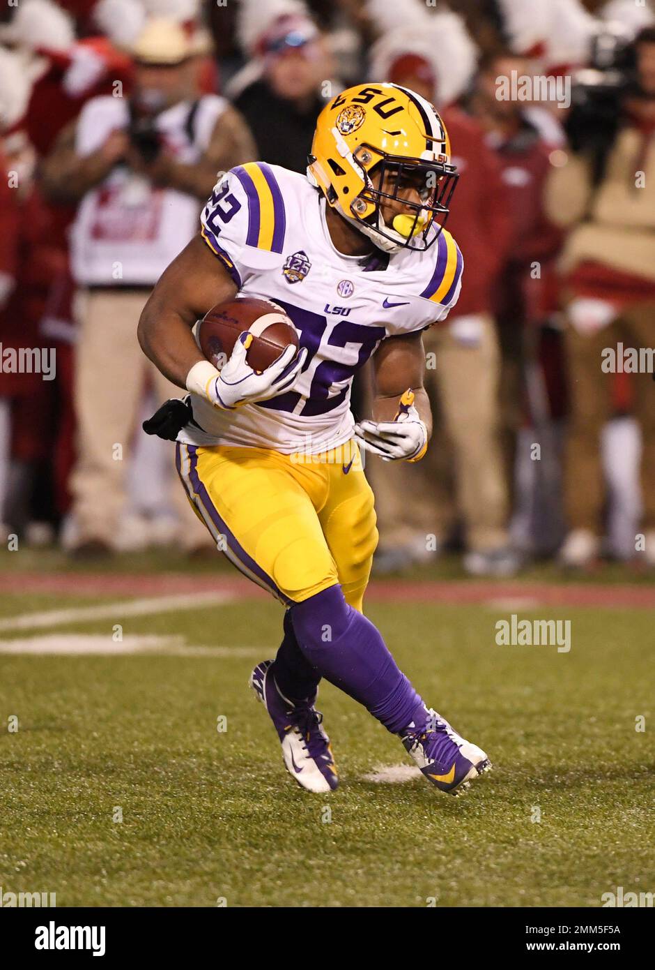 LSU running back Clyde Edwards-Helaire runs the ball against Arkansas ...