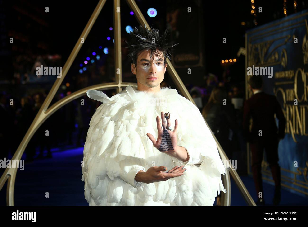 Actor Ezra Miller poses for photographers upon arrival at the premiere ...