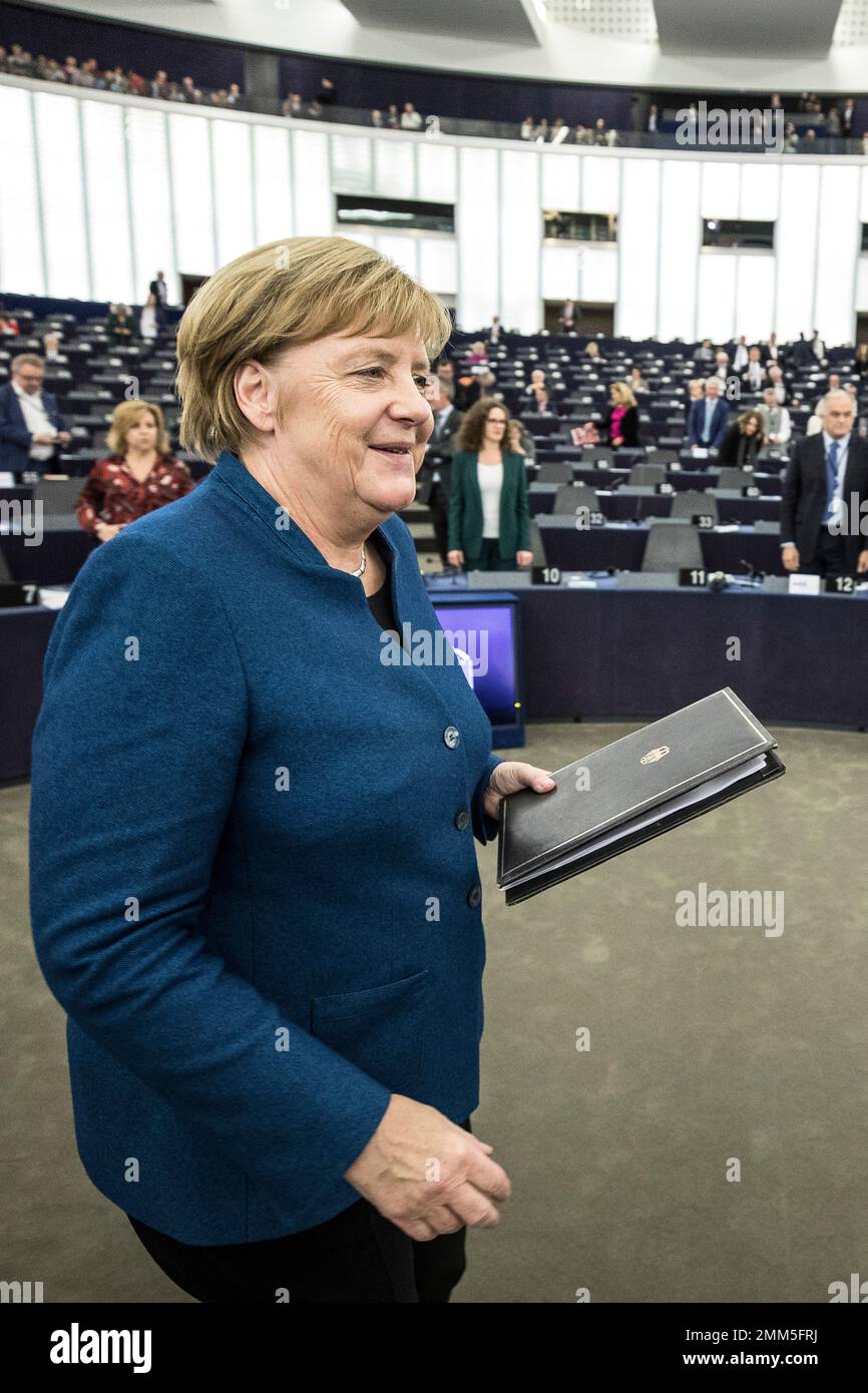 German Chancellor Angela Merkel leaves after debating the future of ...
