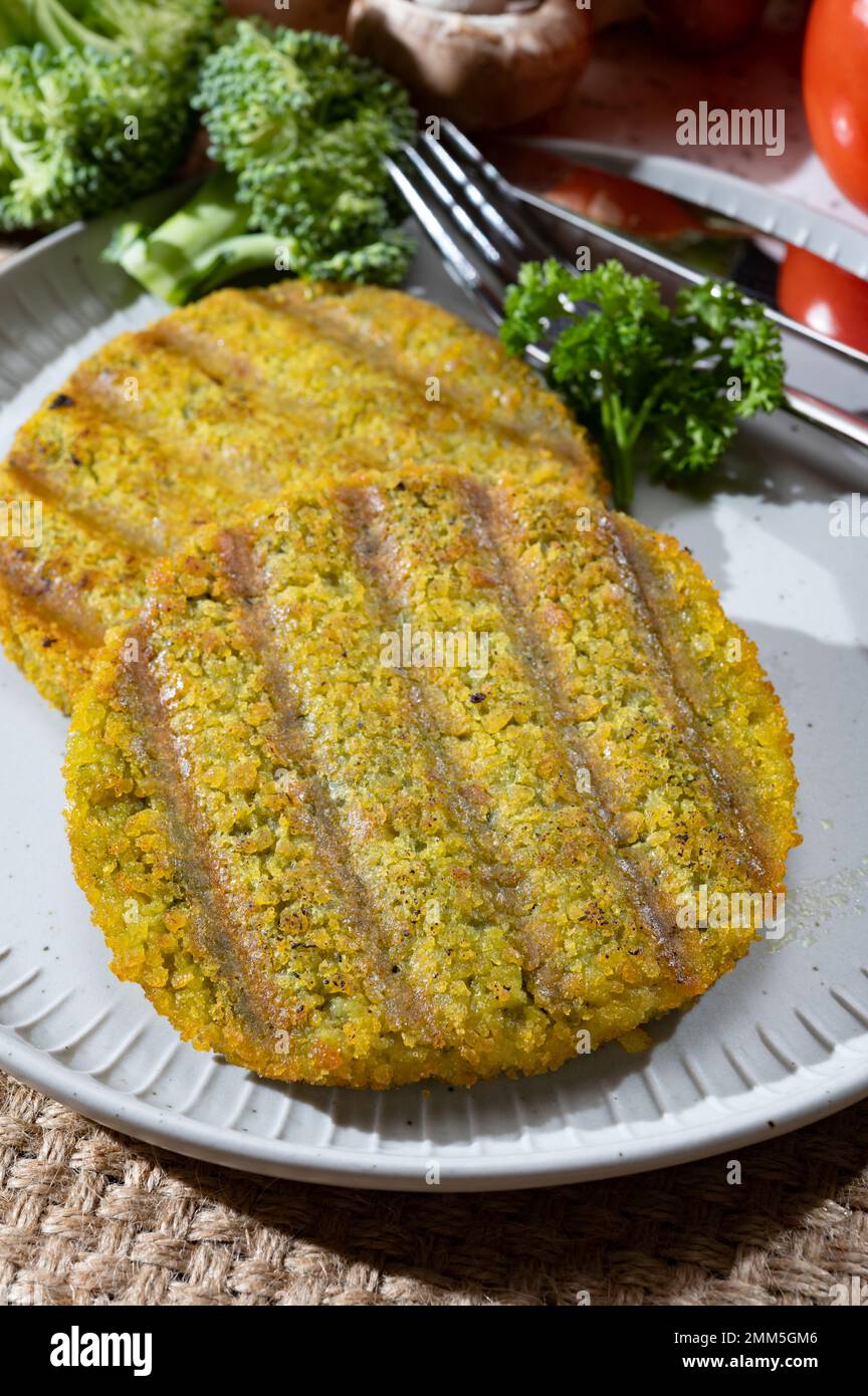 Grilled tasty vegan and vegetarian burgers made from fresh broccoli ...