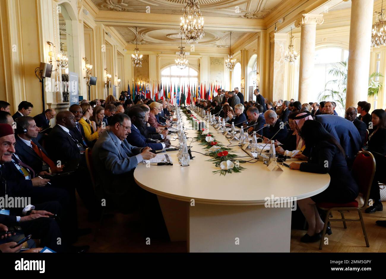 A view of the table during the plenary session of heads of delegations ...