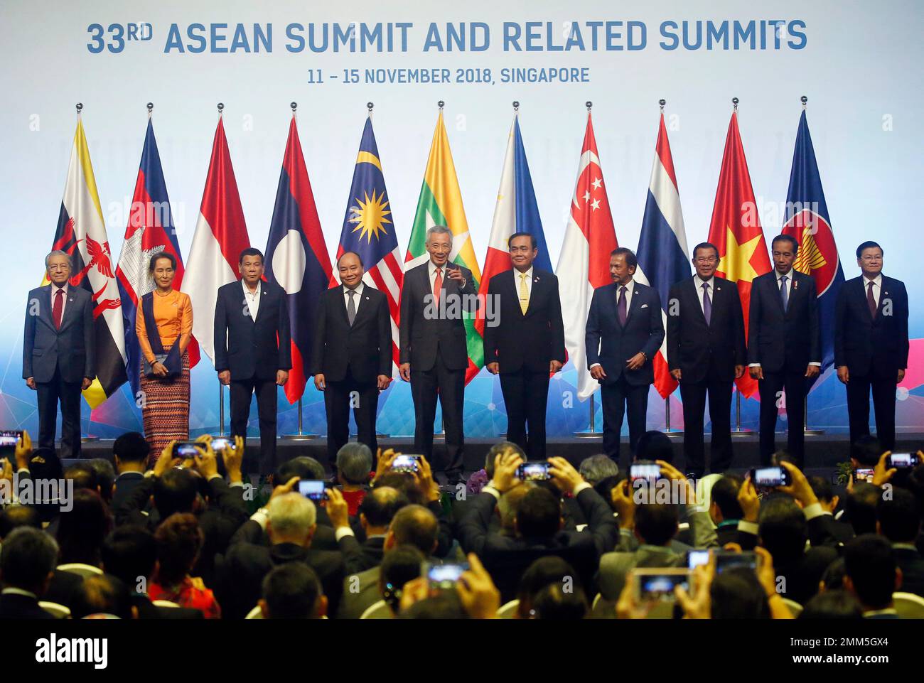 ASEAN Leaders pose for a group photo during the opening ceremony for ...