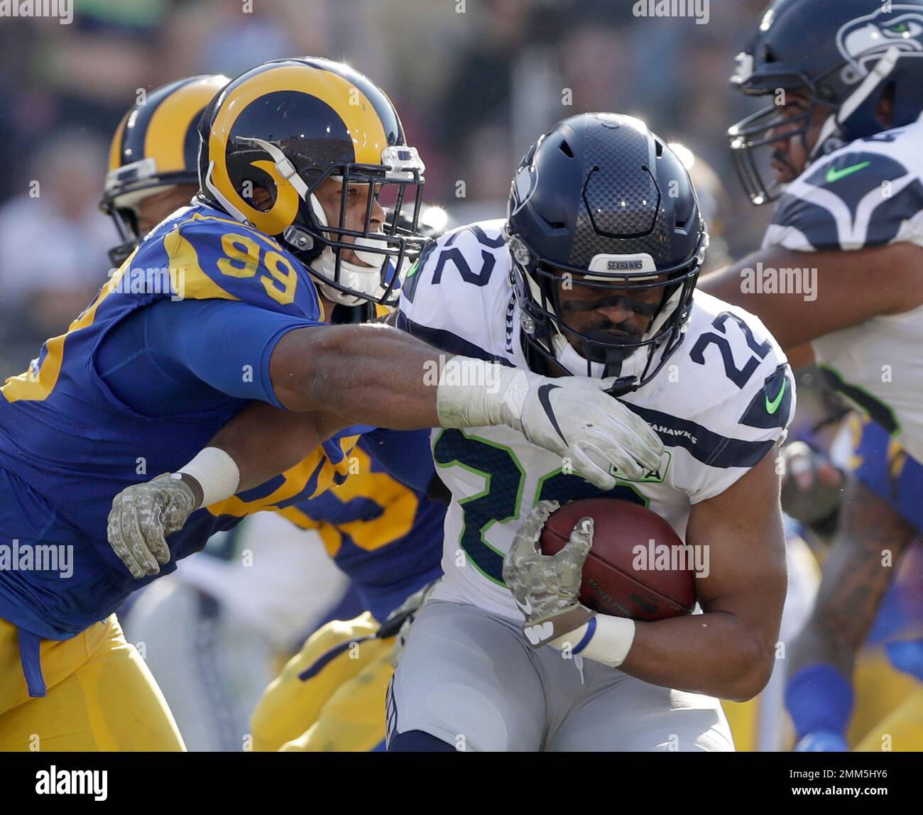 Los Angeles Rams defensive end Aaron Donald, left, tackles Seattle ...
