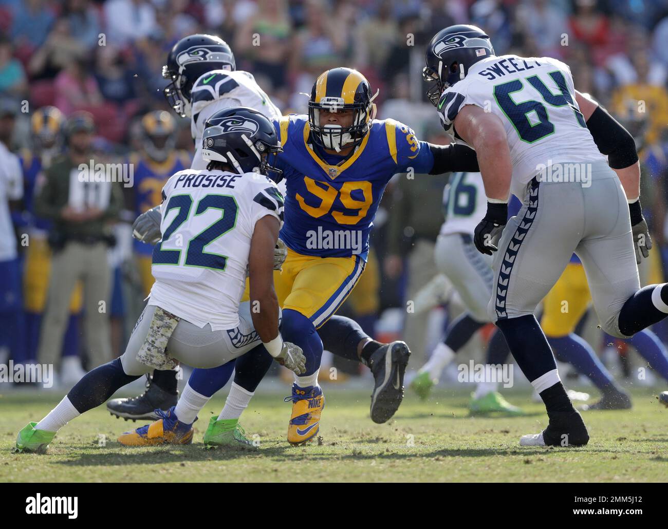Los Angeles Rams defensive end Aaron Donald (99) works off the block by ...