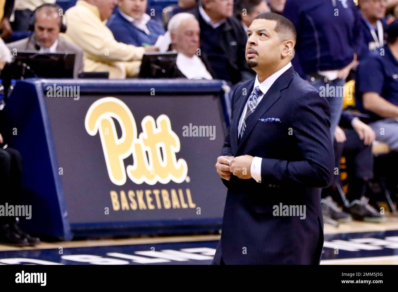 Pittsburgh head coach Jeff Capel walks from the court after the first ...