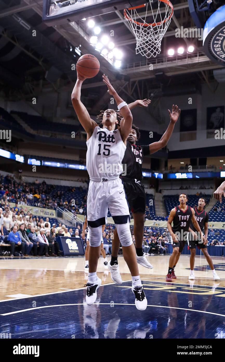 Pittsburgh's Kene Chukwuka (15) shoots in front of Troy's Jordon ...