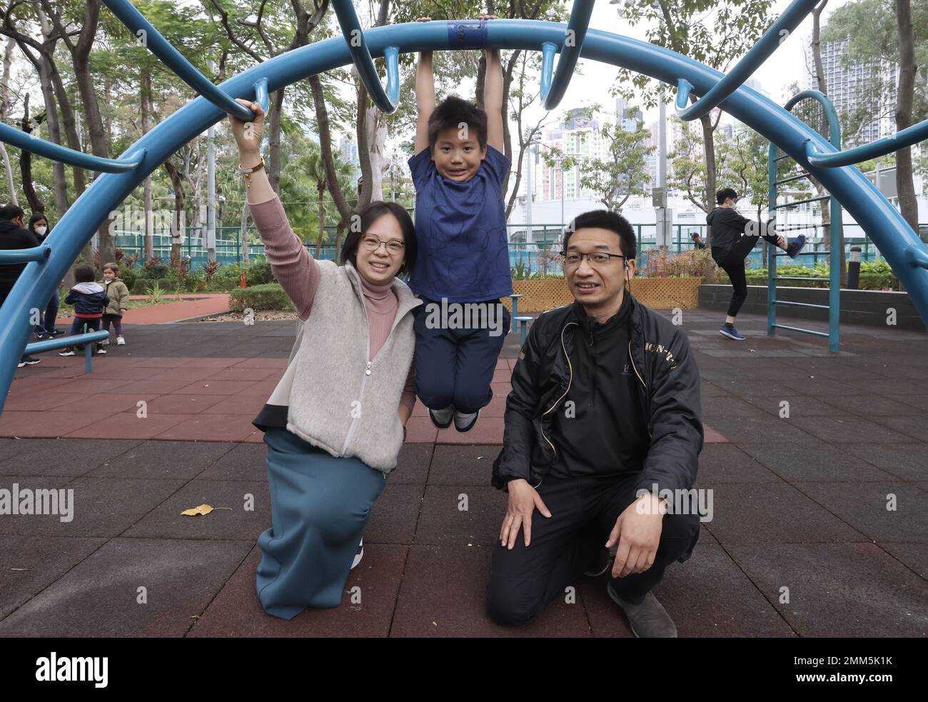 Hong Konger Tracy Chu Siu-mei, with her family, 10-year-old son Ethan ...