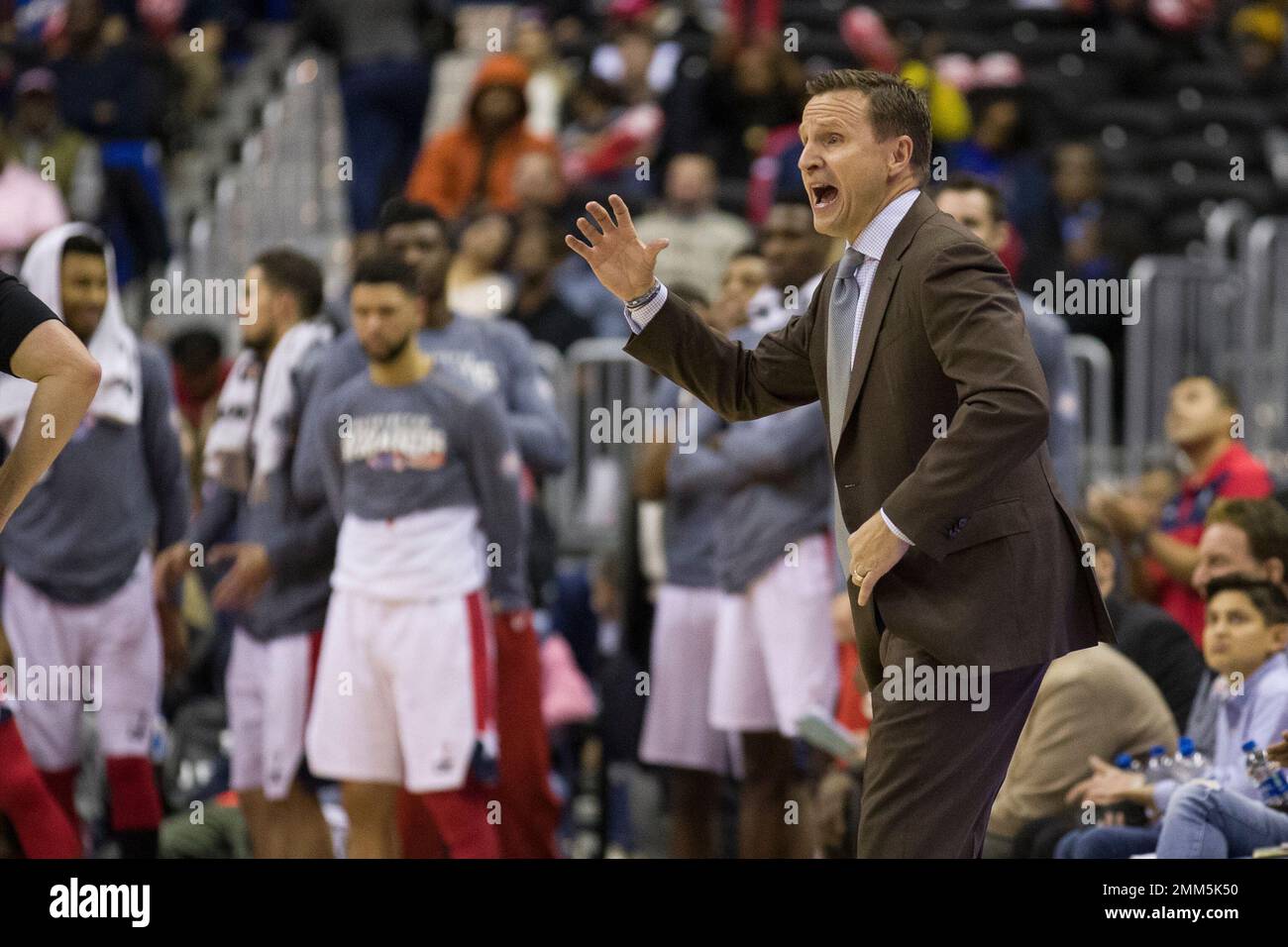 Washington Wizards head coach Scott Brooks, right, directs his team ...