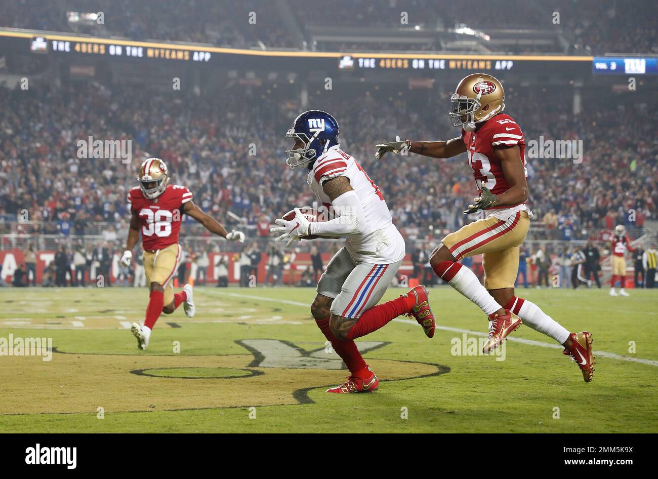 New York Giants wide receiver Odell Beckham Jr., center, scores in ...
