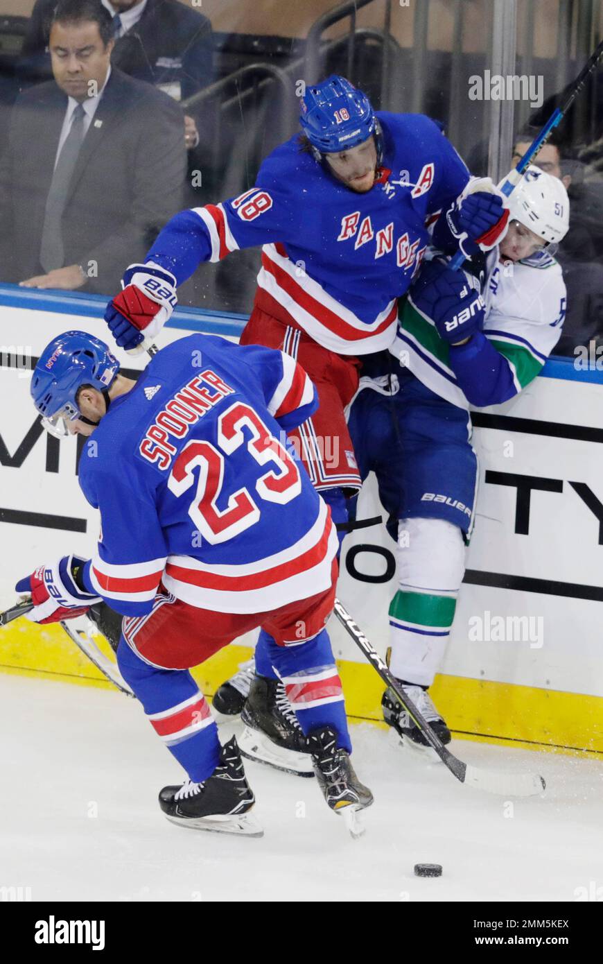 New York Rangers' Marc Staal (18) checks Vancouver Canucks' Troy ...