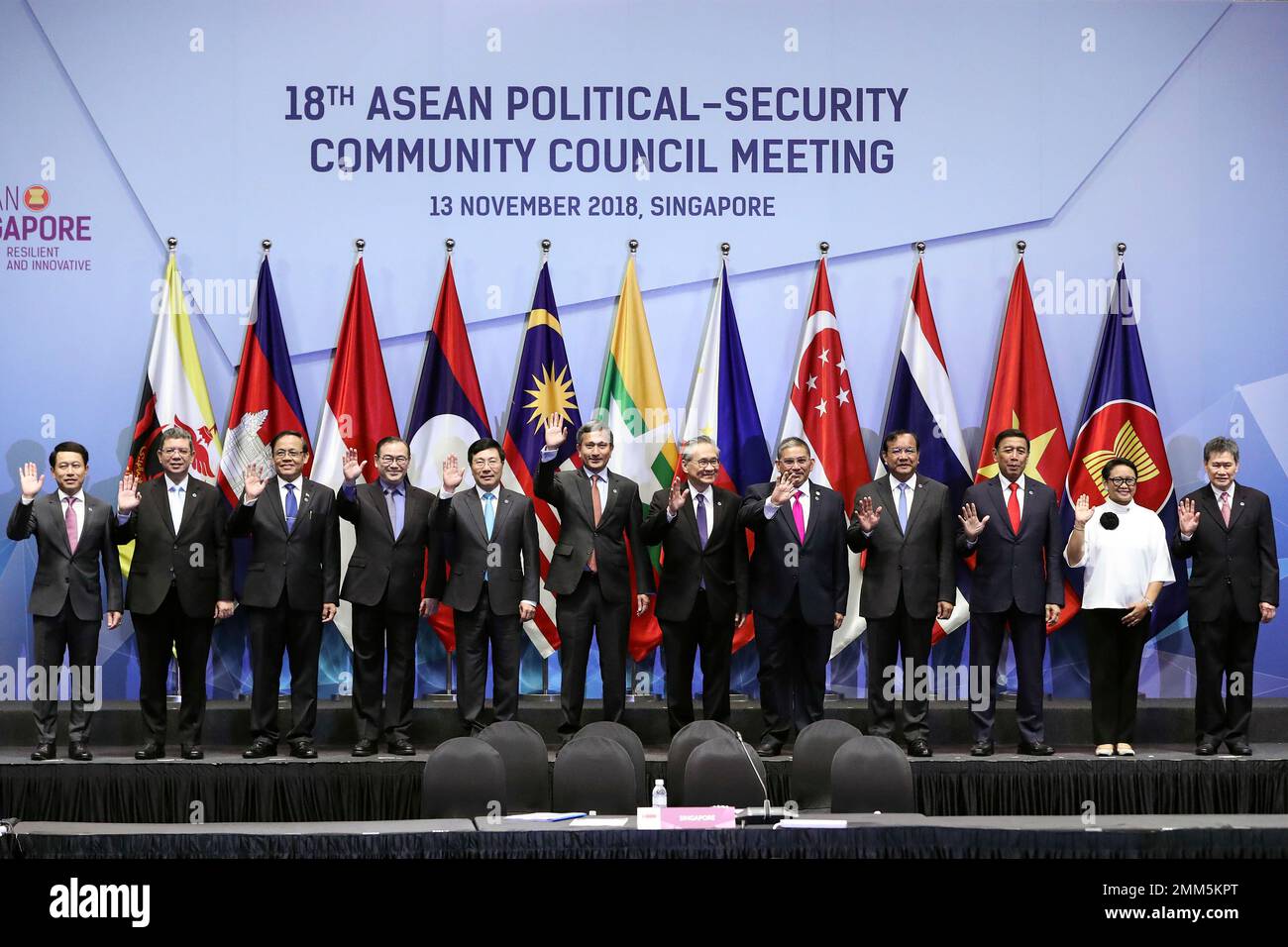 ASEAN ministerial delegates pose for a photo during the 18th ASEAN ...