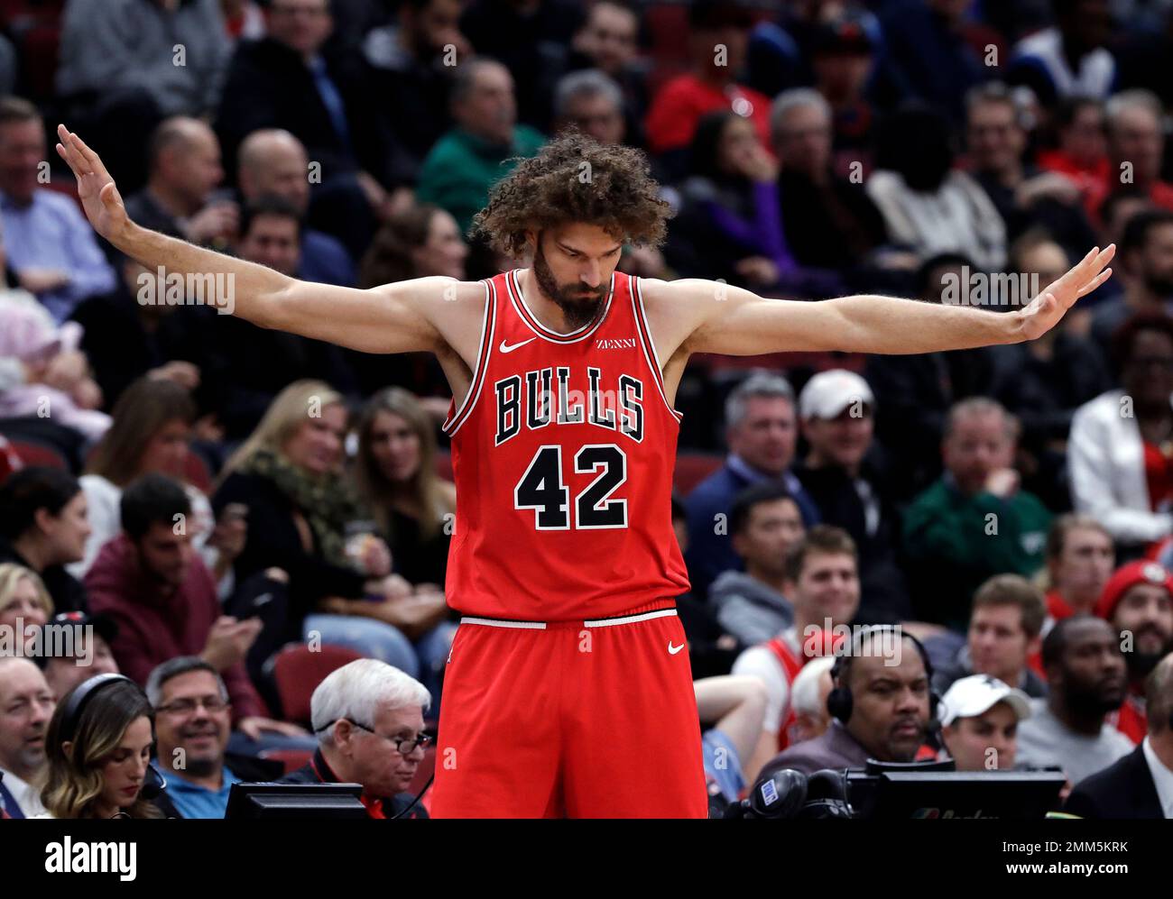 Chicago Bulls center Robin Lopez stretches during the first half of an ...