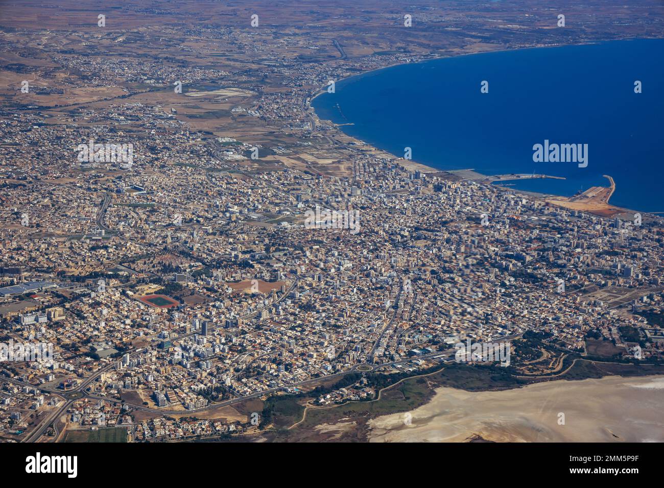 Aerial view from plane window with Larnaca city in Cyprus island ...