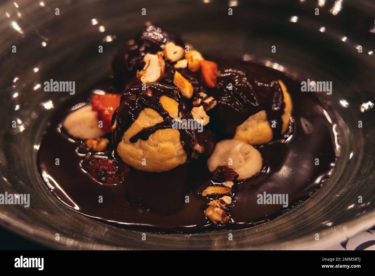 Chocolate profiteroles dessert in restaurant in Cyprus island country ...