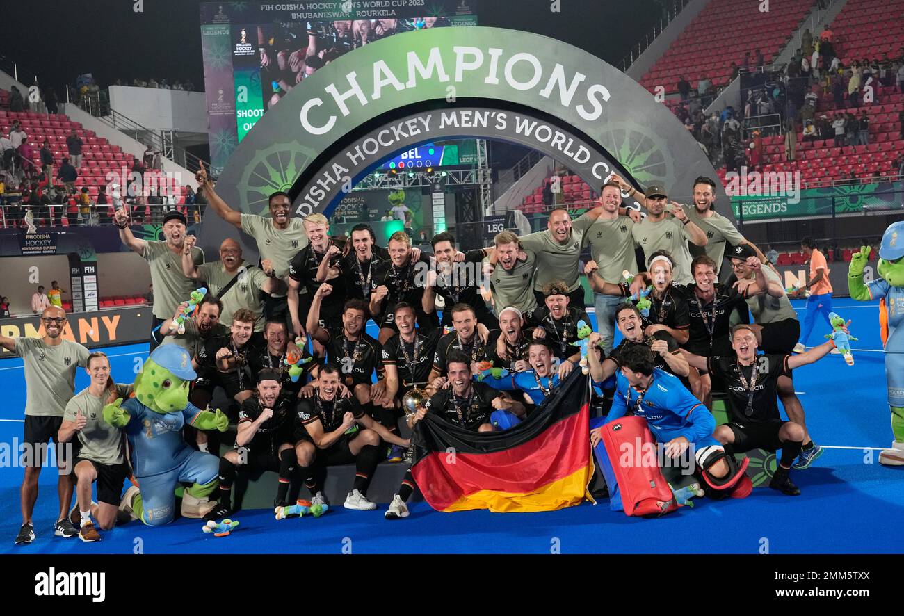 German Players Celebrate With The Winners Trophy After Their Win Over German Players Celebrate With The Winners Trophy After Their Win Over
