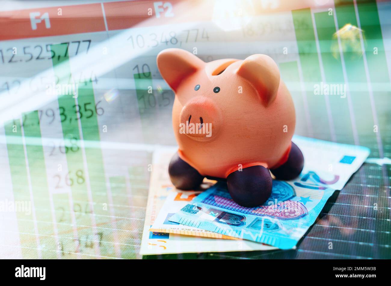 Piggybank on solar panel concept of money saved by using clean energy ...