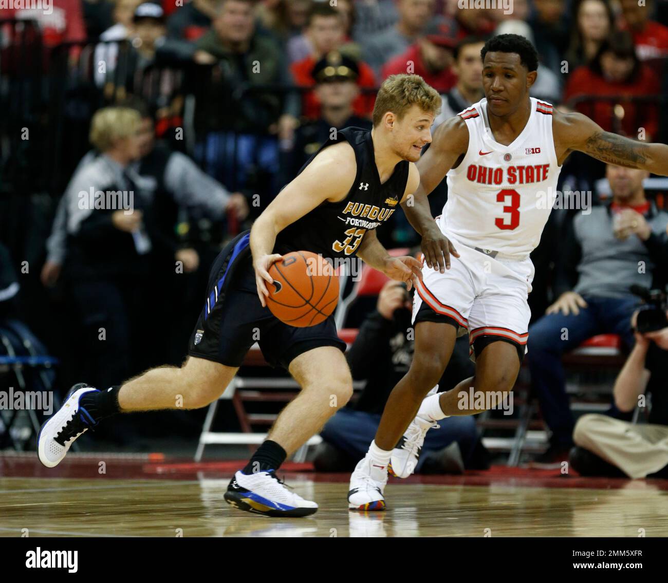 Purdue Fort Wayne guard Matt Weir, left, drives against Ohio State ...