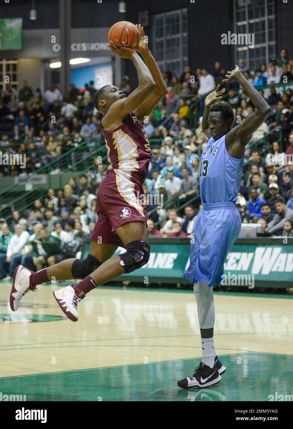 Florida State's forward Mfiondu Kabengele (left) shoots against Tulane ...