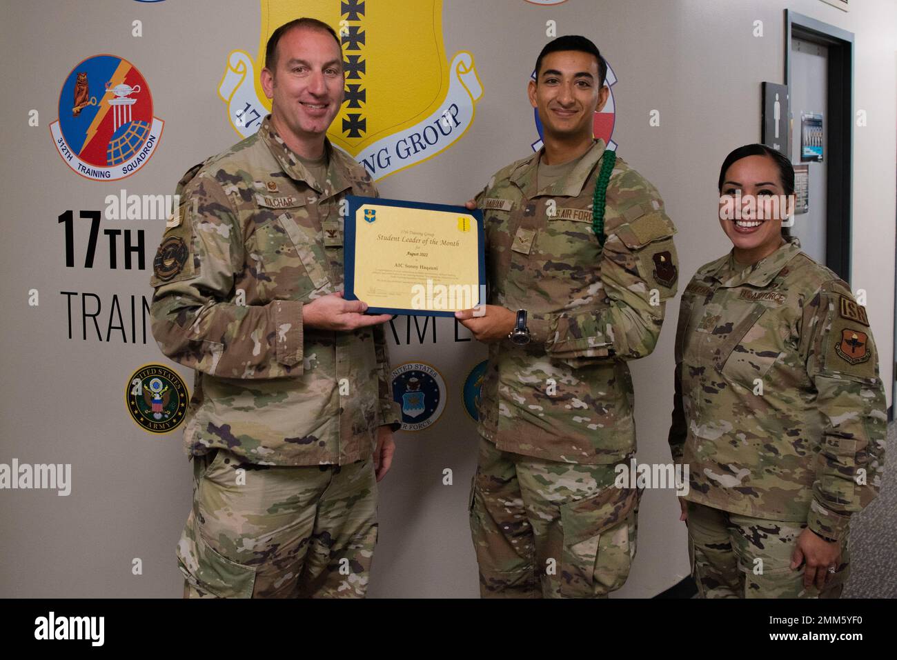 U.S. Air Force Col. Jason Kulchar, 17th Training Group commander, and Chief Master Sgt. Valerie ...