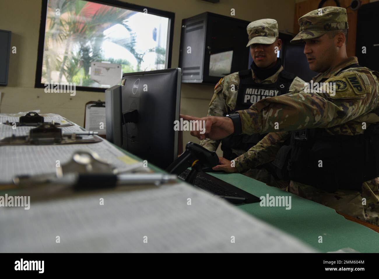Sgt. Eduardo Martinez. and Pfc. Brian Rodriguez, both military police ...
