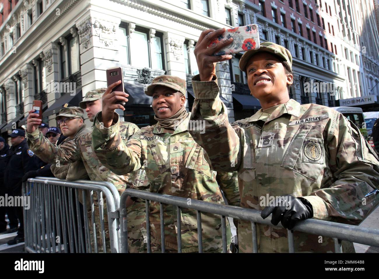 Veteran Mariecha Rowe-Watson, of New York, right, watches as the ...