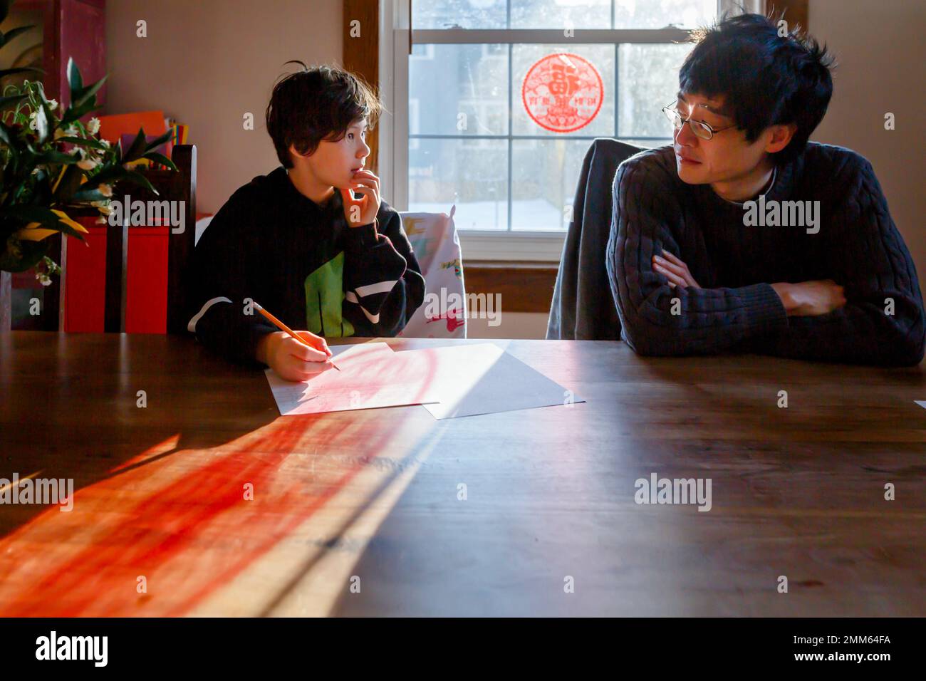 Father son homework hi-res stock photography and images - Alamy