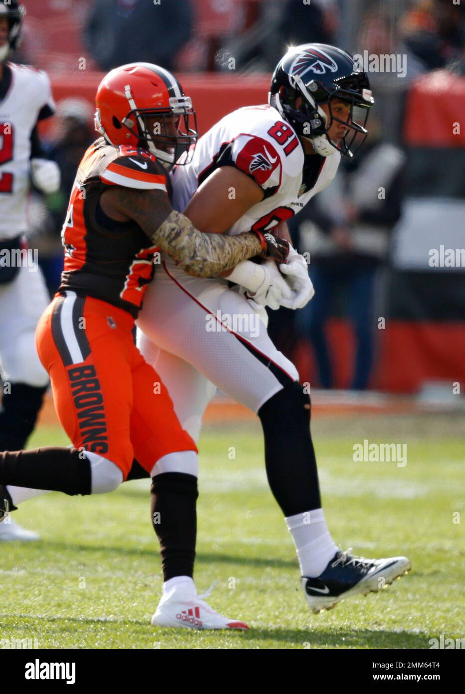 Atlanta Falcons tight end Austin Hooper (81) is tackled by Cleveland ...