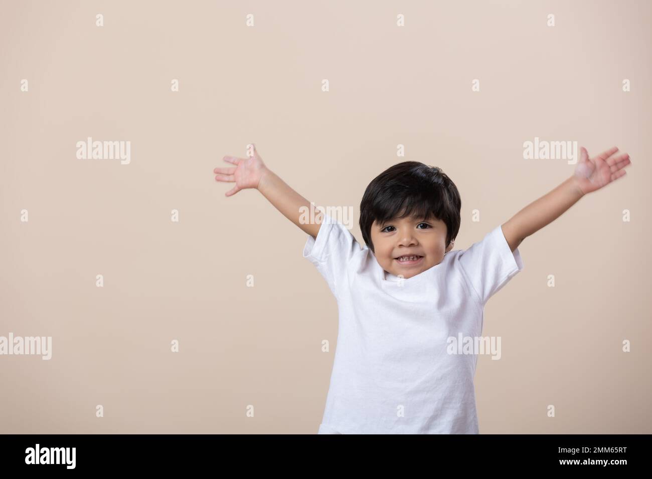 Happy Mexican little boy arms wide open Stock Photo - Alamy