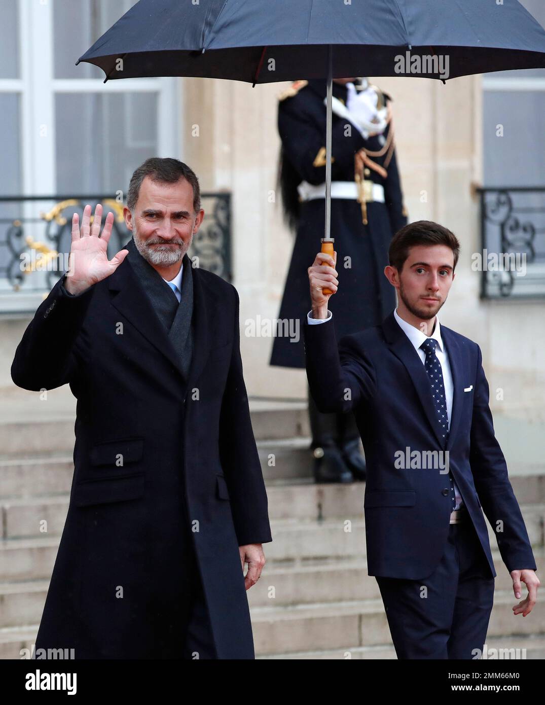 Spain's King Felipe waves as he leaves the Elysee Palace in Paris ...